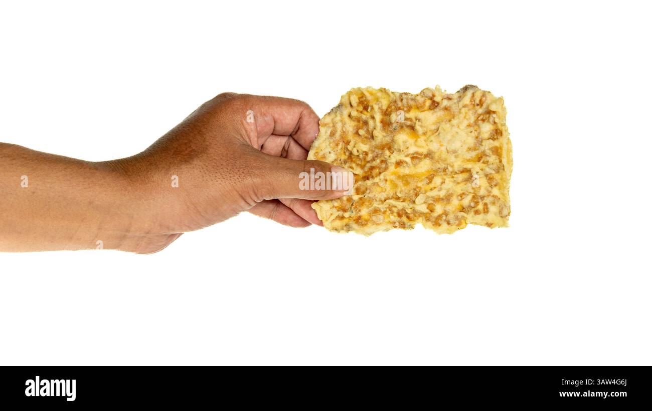 Hand holding tempe chips crispy hi-res stock photography and images - Alamy