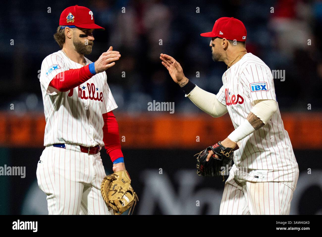Philadelphia Phillies' Bryce Harper, left, celebrates the win with Nick ...