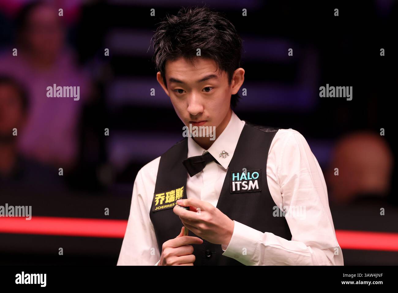 Wu Yize during his match against Mark Williams (not pictured) during ...