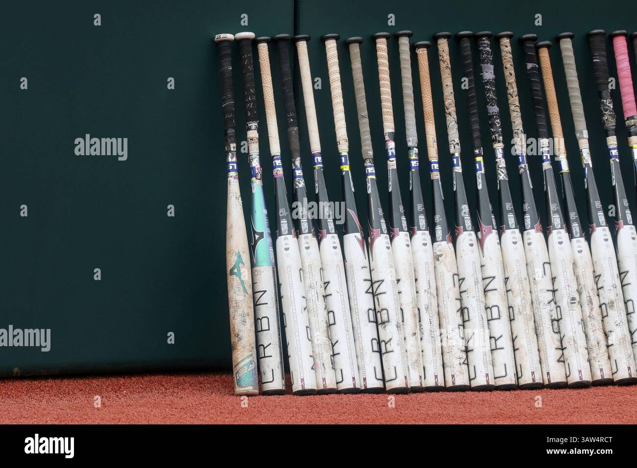 AUSTIN, TX - APRIL 18: Bats are lined up against the backstop before ...