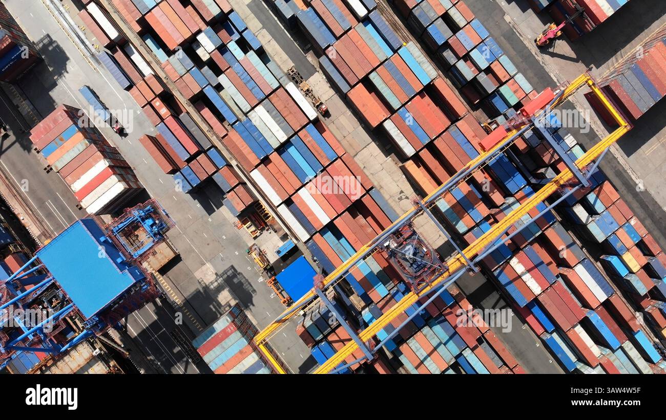 Aerial Perspective Of Container Ship Loading Operations Highlighting Maritime Cargo Handling At