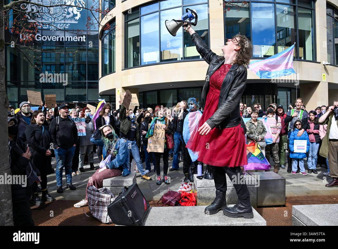 EDITORS NOTE LANGUAGE ON PLACARD People from trans rights groups and ...