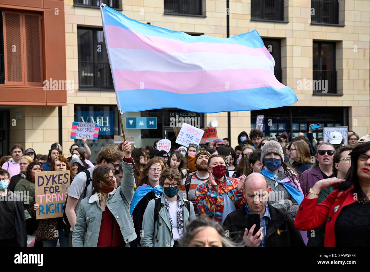 EDITORS NOTE LANGUAGE ON PLACARD People from trans rights groups and ...