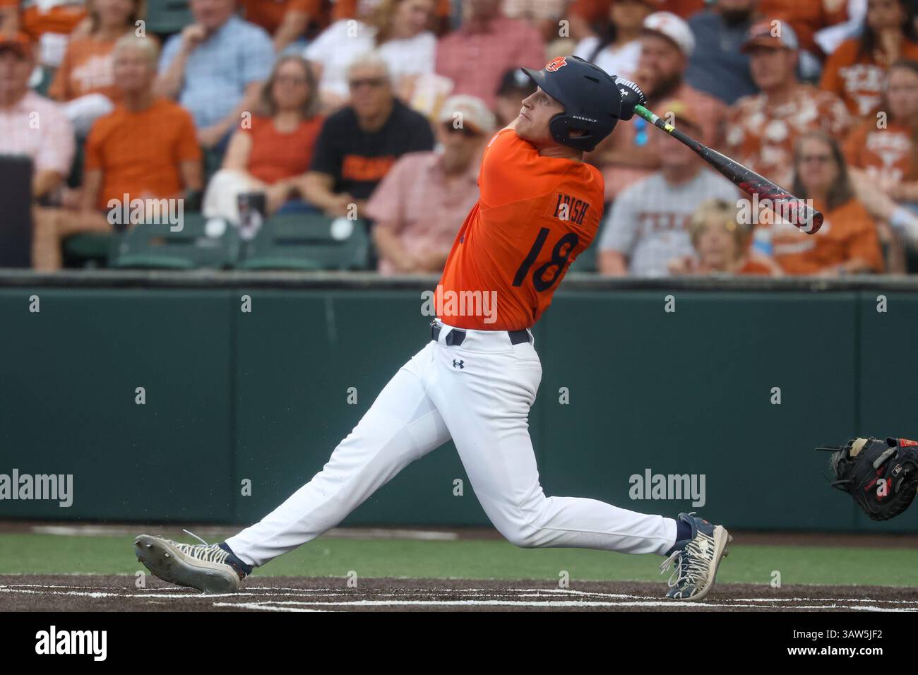 AUSTIN, TX - APRIL 18: Auburn catcher Ike Irish (18) watches his home ...
