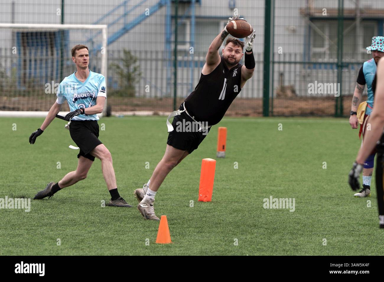 Sideline catch during flag football games in Cardiff Wales, April, 2025 ...