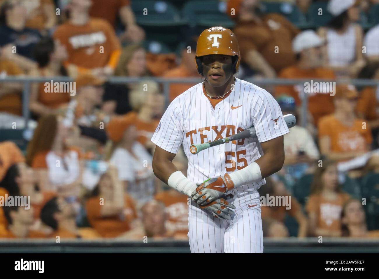 AUSTIN, TX - APRIL 18: Texas outfielder Jonah Williams (55) adjusts his ...