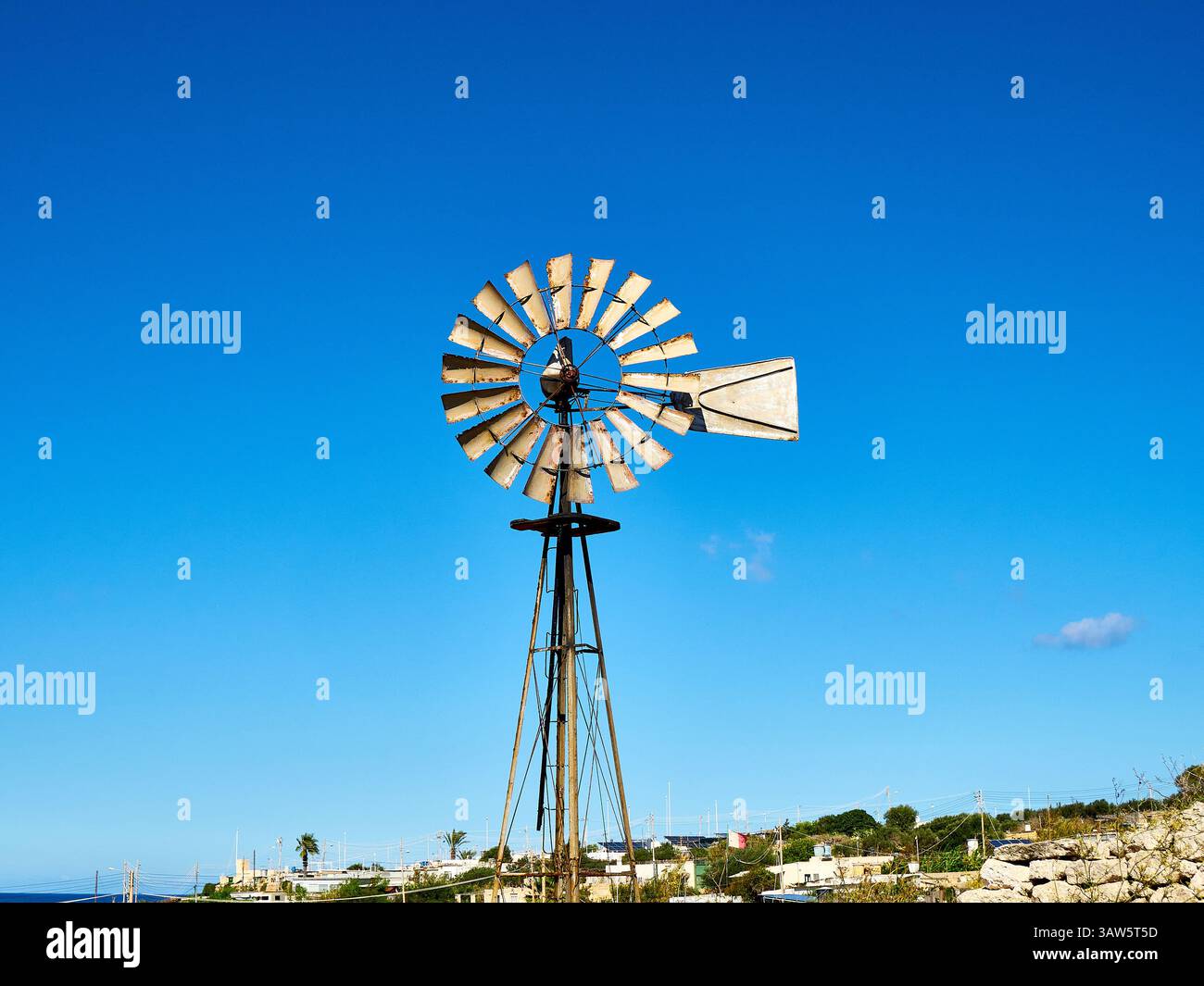 Classic vintage style windmill used on farms Stock Photo - Alamy