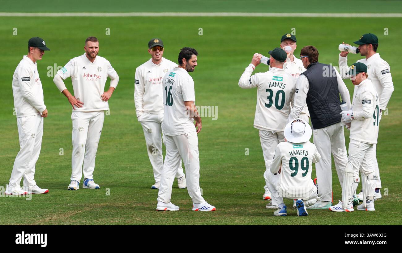 #16, Brett Hutton of Nottinghamshire (no cap, centre) with team ...