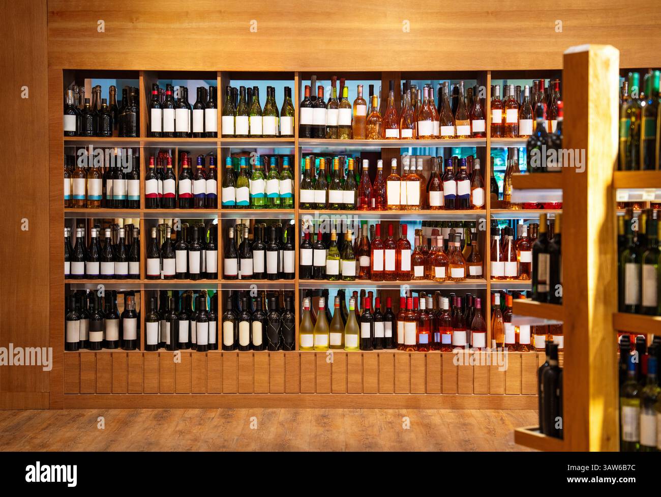Front view assortment of wine on retail display in liquor store Stock ...