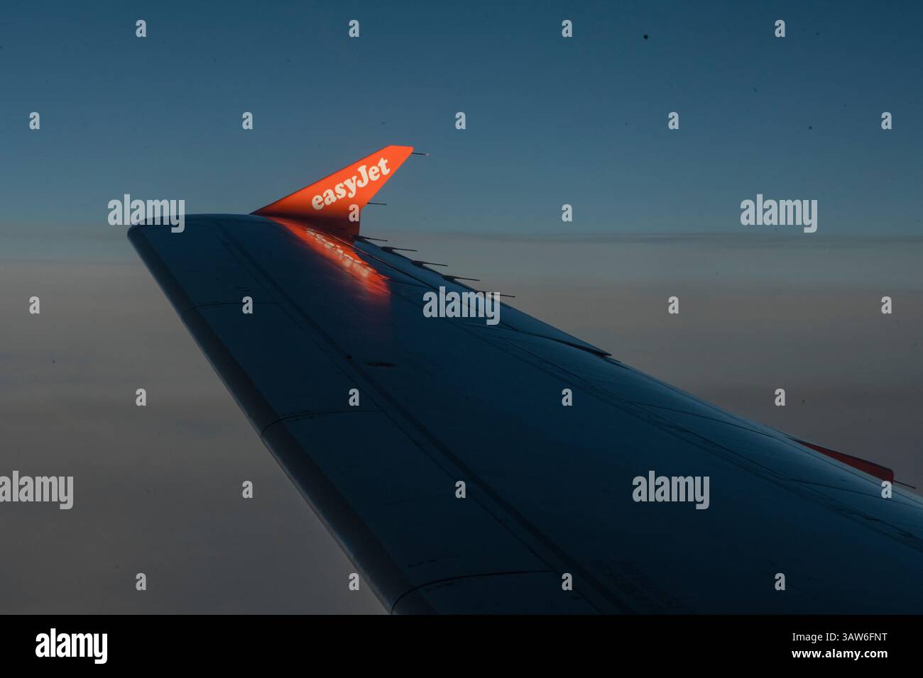 Wing and livery detail of an EasyJet Airbus A319 / A320 wings. Sunlit ...