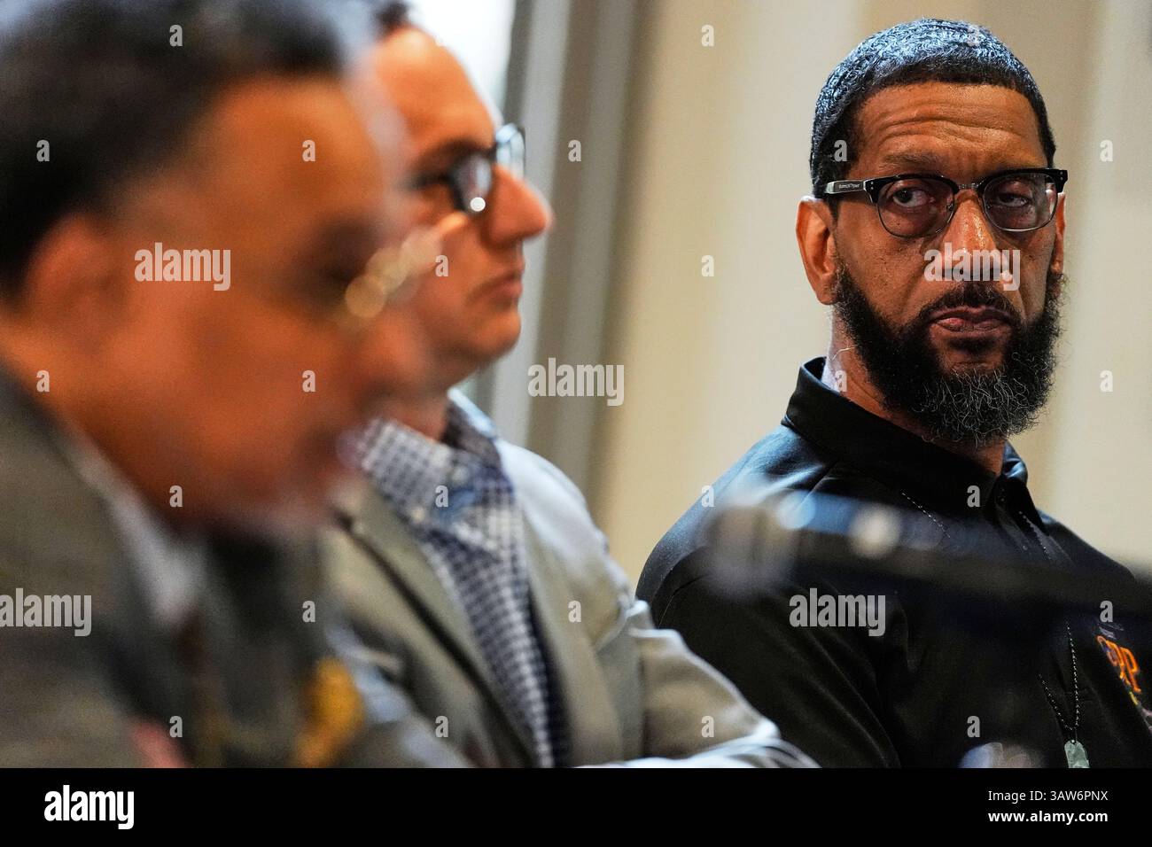 Ray Kelly, executive director of the Citizens Policing Project, listens ...