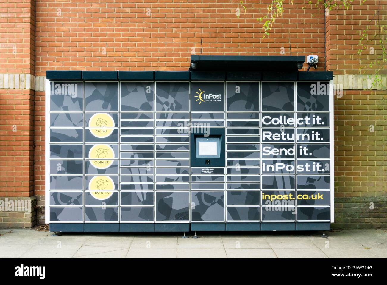 An InPost parcel locker in a supermarket car park Stock Photo - Alamy