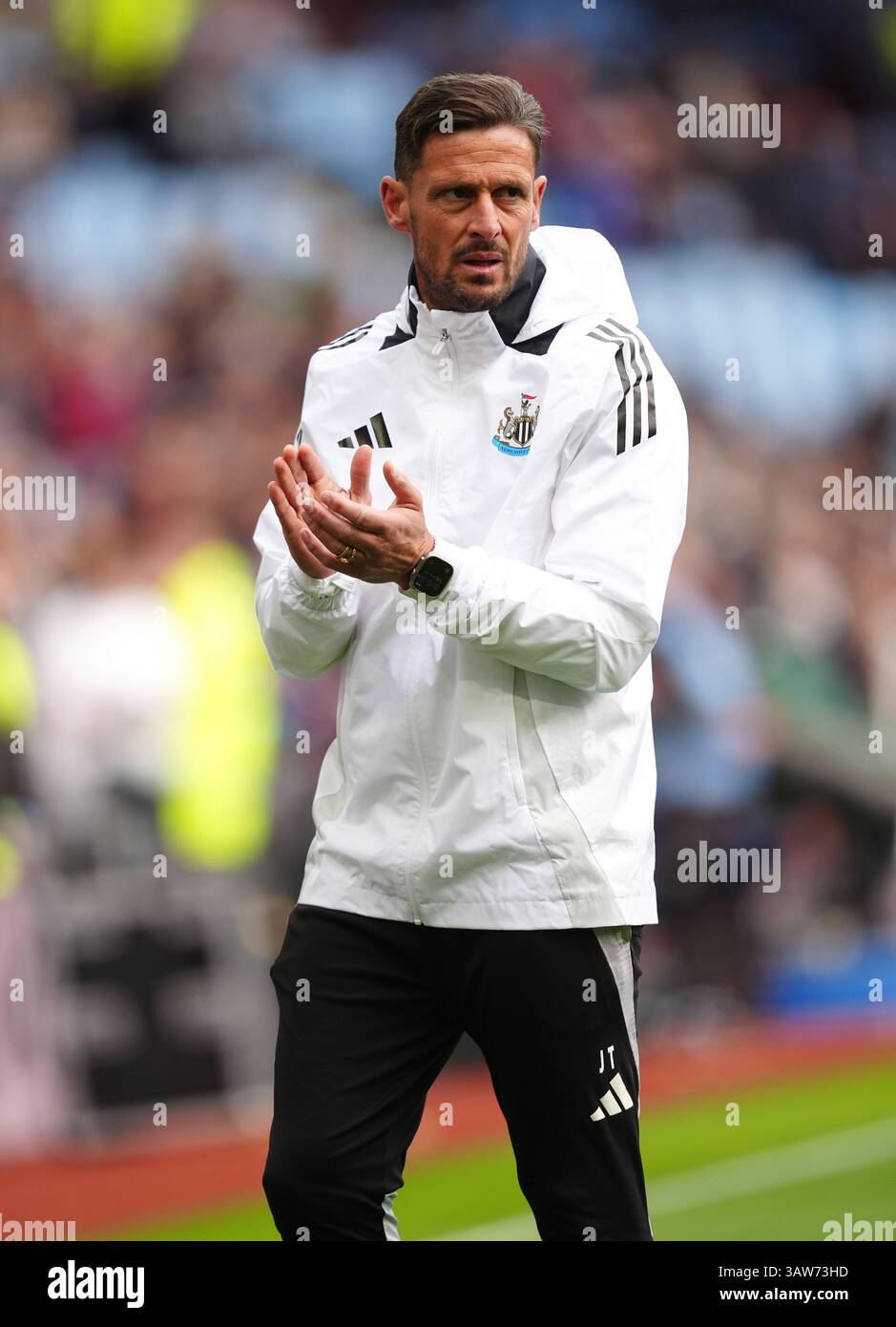 Newcastle United assistant manger Jason Tindall watches the warm up ...