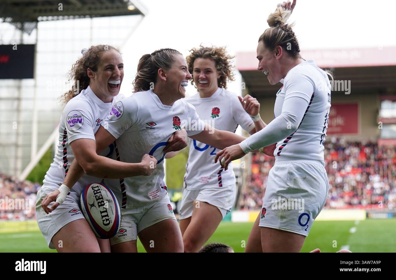 England's Claudia MacDonald celebrates scoring a try during the ...