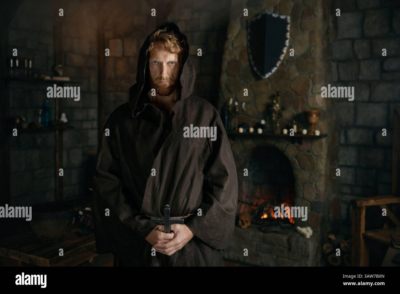 Medieval monk standing in cathedral Stock Photo - Alamy