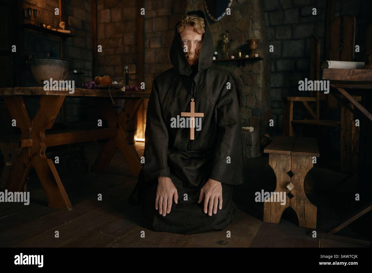 Medieval monk praying to God looking upward in monastery Stock Photo ...
