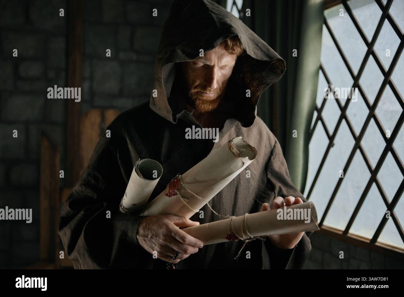 Medieval monk holding obsolete hi-res stock photography and images - Alamy
