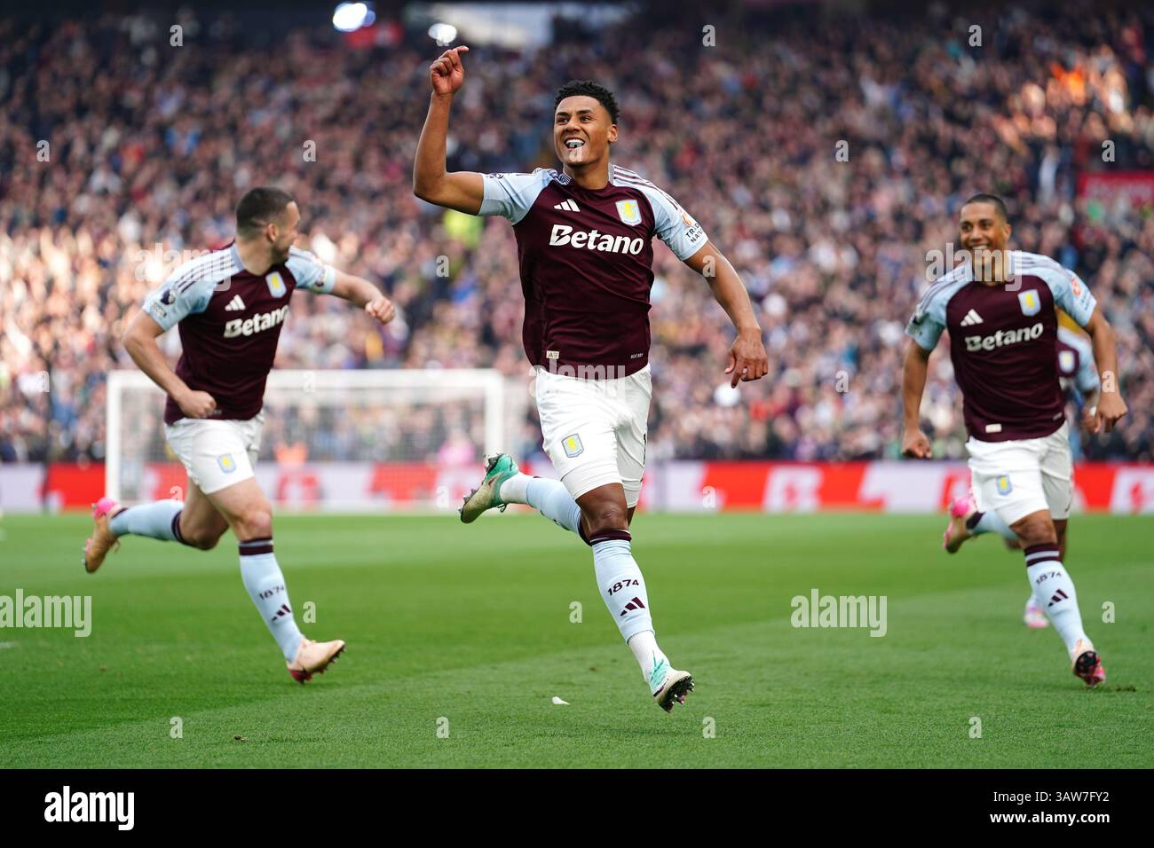 Aston Villa's Ollie Watkins (centre) celebrates scoring their side's ...