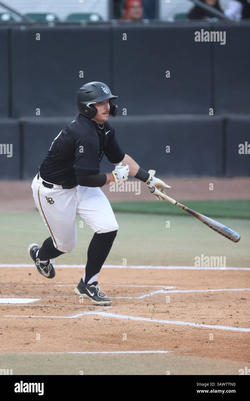 Connor Charpiot (8) of the Long Beach State Dirtbags bats against the ...