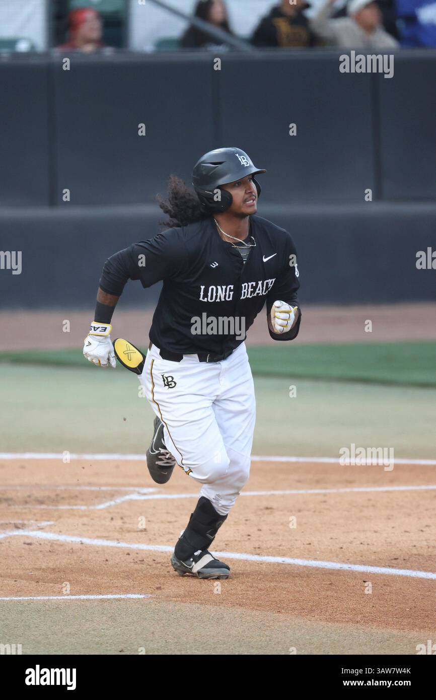 Dylan Lina (31) of the Long Beach State Dirtbags runs to first base ...