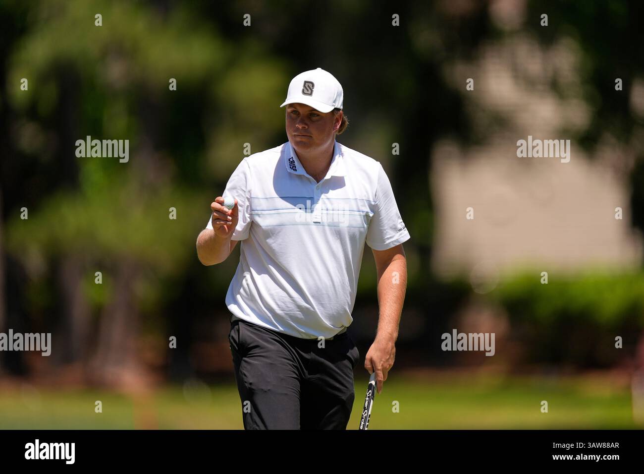 Sami Valimaki reacts to a putt on the second hole during the third ...