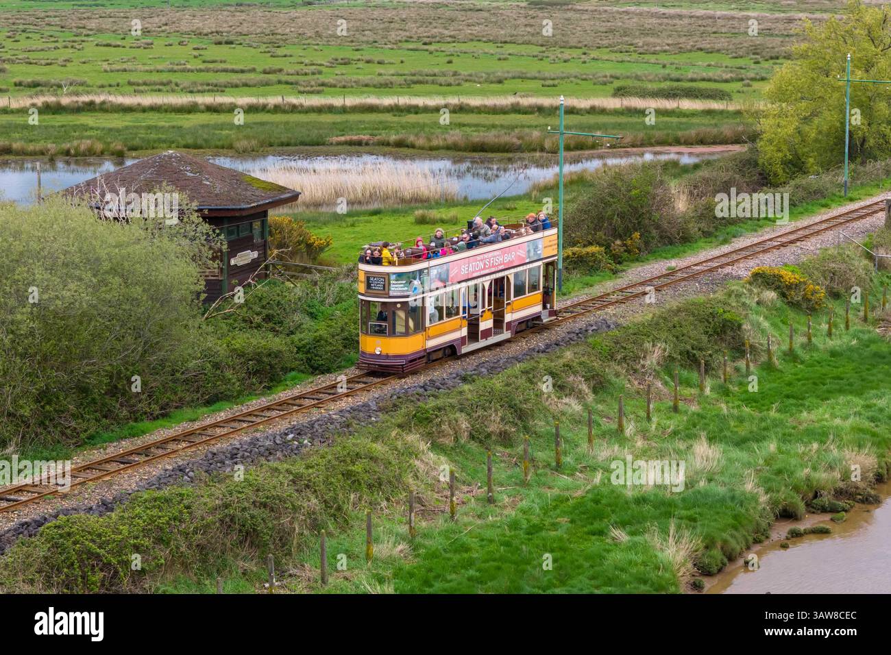Seaton, Devon, UK. 19th April 2025. UK Weather. Holidaymakers enjoying ...