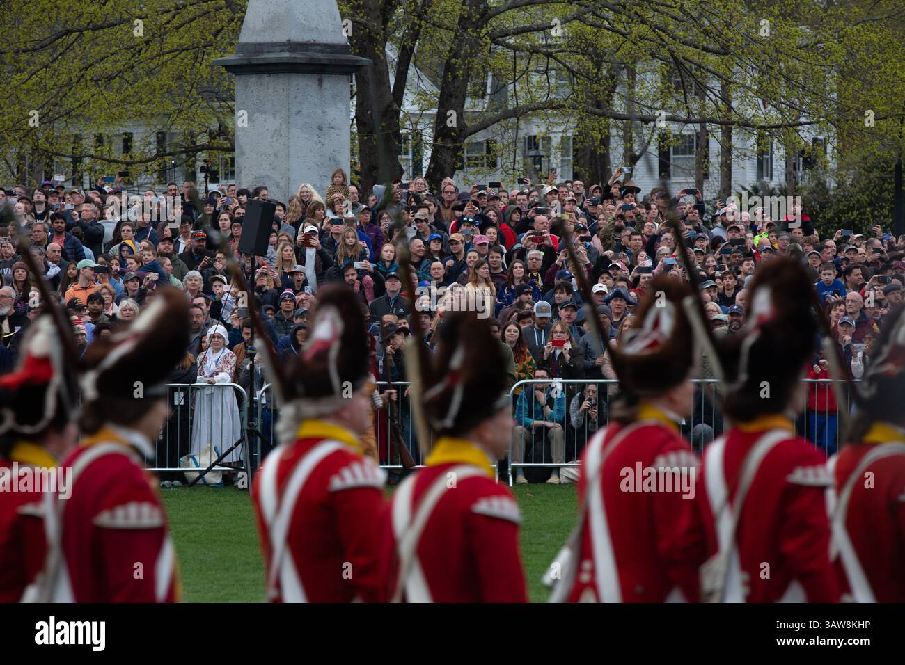 Reenactors playing British Redcoats march at the 250th Anniversary of ...