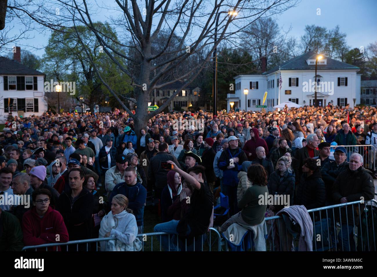 Spectators watch a reenactment at the 250th Anniversary of the Battle ...