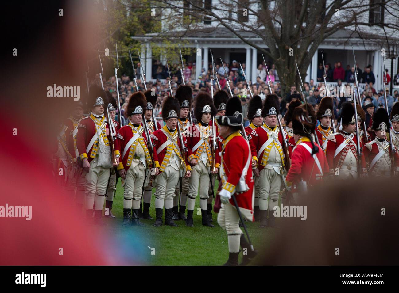Lexington, USA. 19th Apr, 2025. Reenactors playing British Redcoats ...