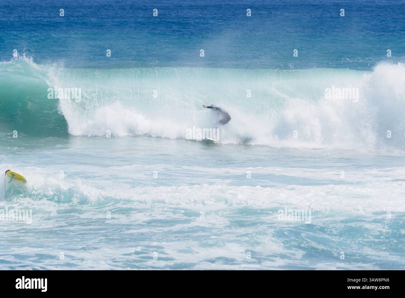 Ocean wave breaking on surfer. Wipeout surfing Stock Photo - Alamy