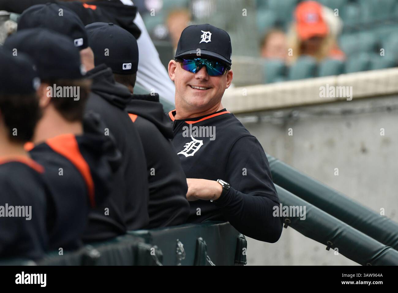 Detroit Tigers manager A.J. Hinch smiles in the dugout before a ...