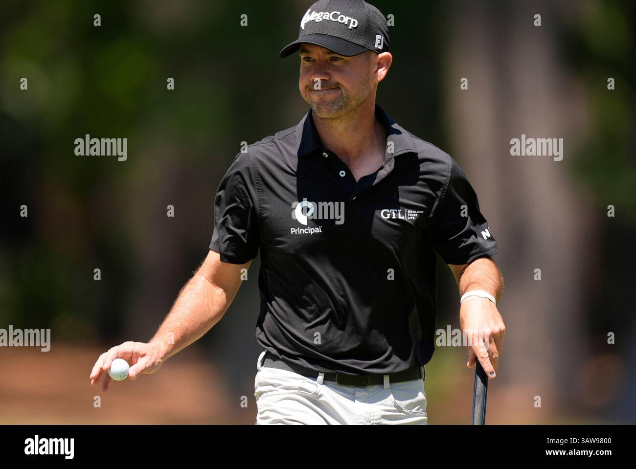 Brian Harman reacts after a putt on the second hole during the third ...