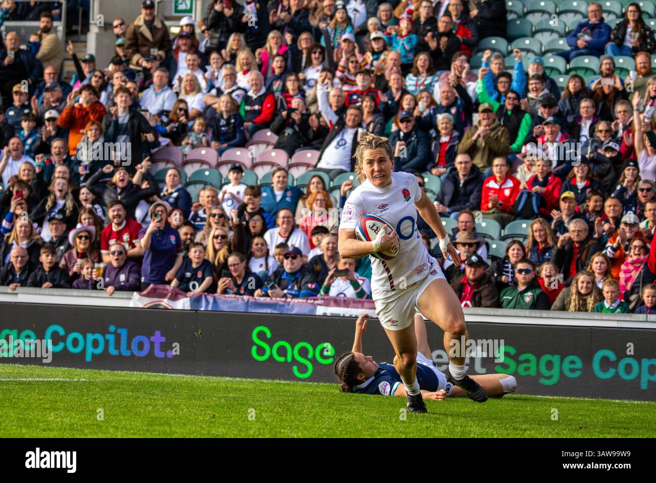 Leicester, UK, 19th April 2025 England wing Claudia MacDonald runs in ...