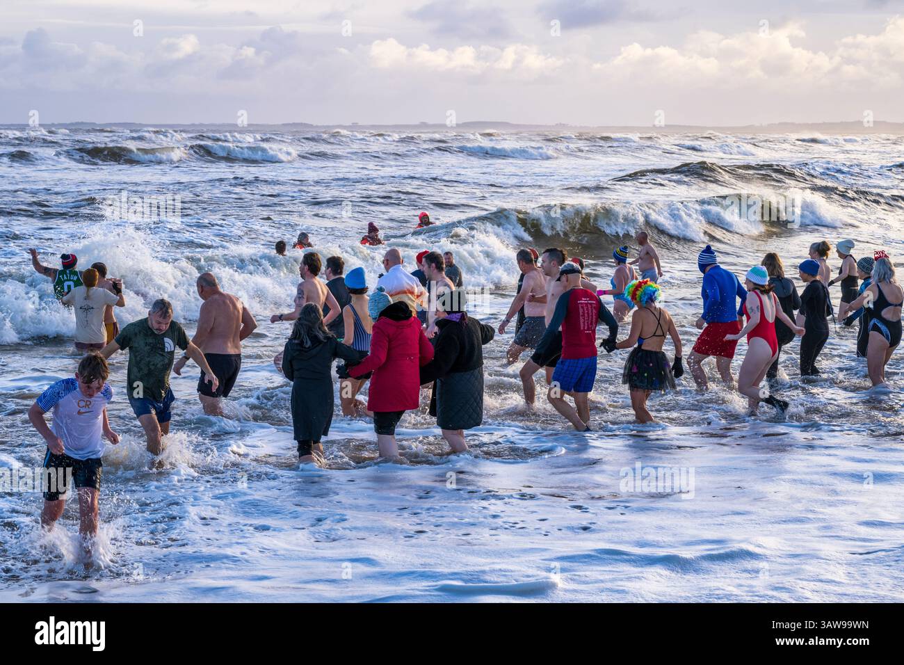Annual New Year’s Day loony dook at Dornoch beach in Sutherland ...