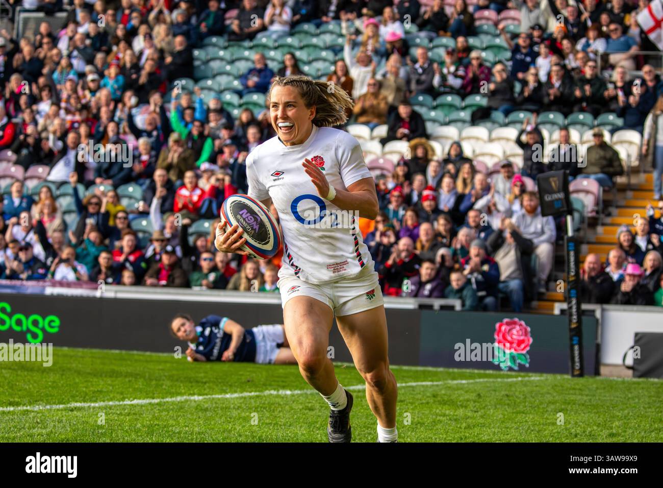 Leicester, UK, 19th April 2025 England wing Claudia MacDonald runs in ...