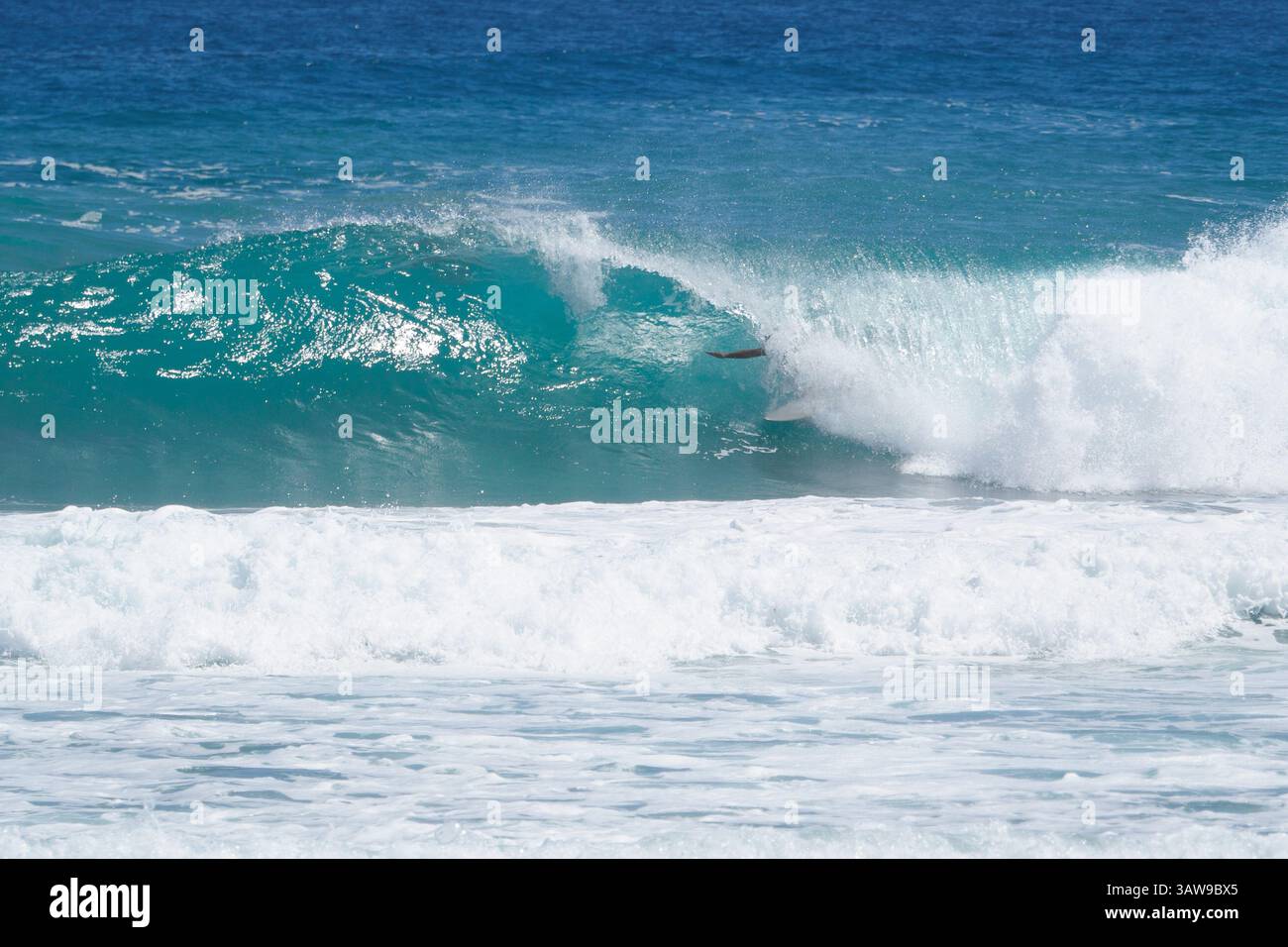 Professional surfer riding wave in hi-res stock photography and images ...