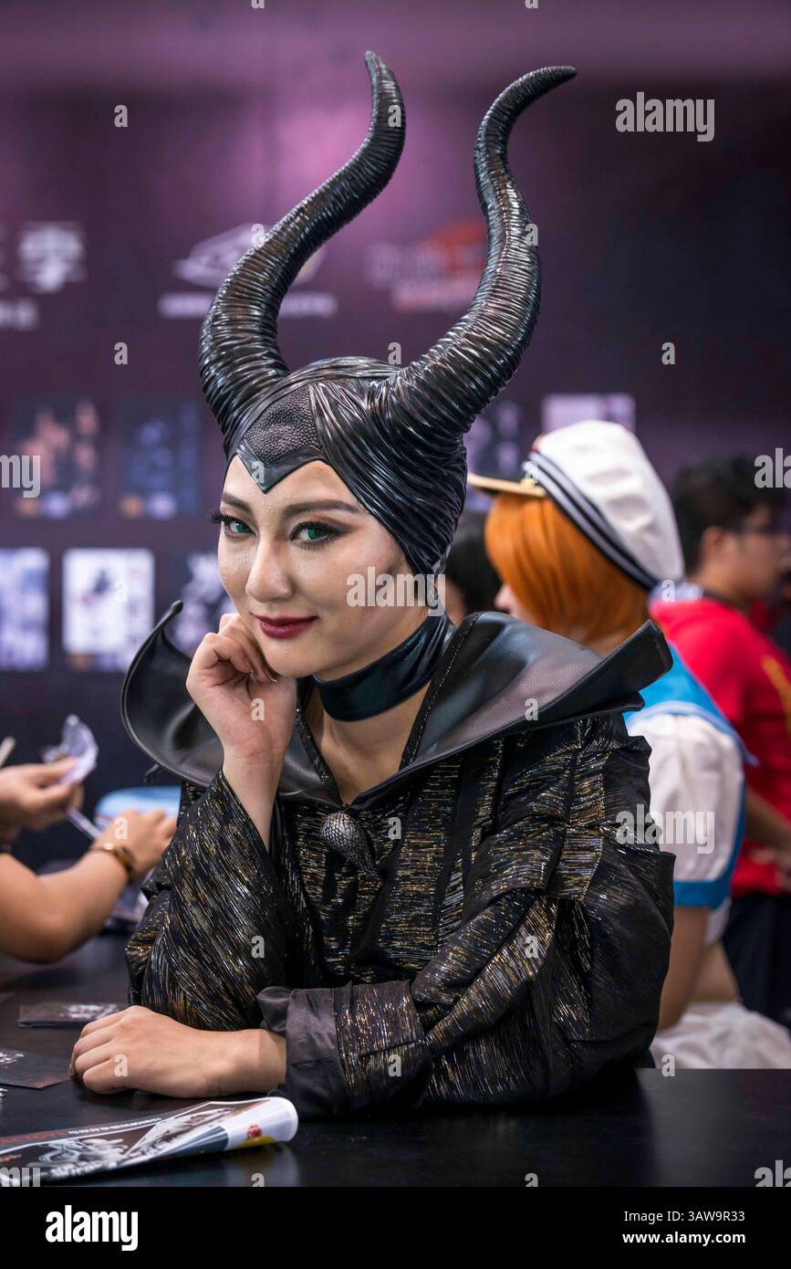 Jun 9, 2016 - Beijing, China - A cosplayer poses at her booth at ...