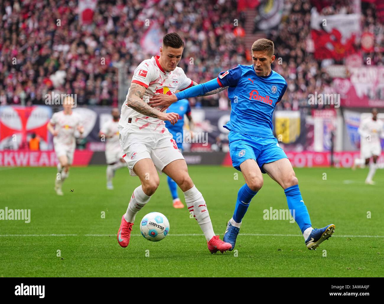 April 19 2025: Benjamin Sesko of RB Leipzig and Steven Skrzybski of ...