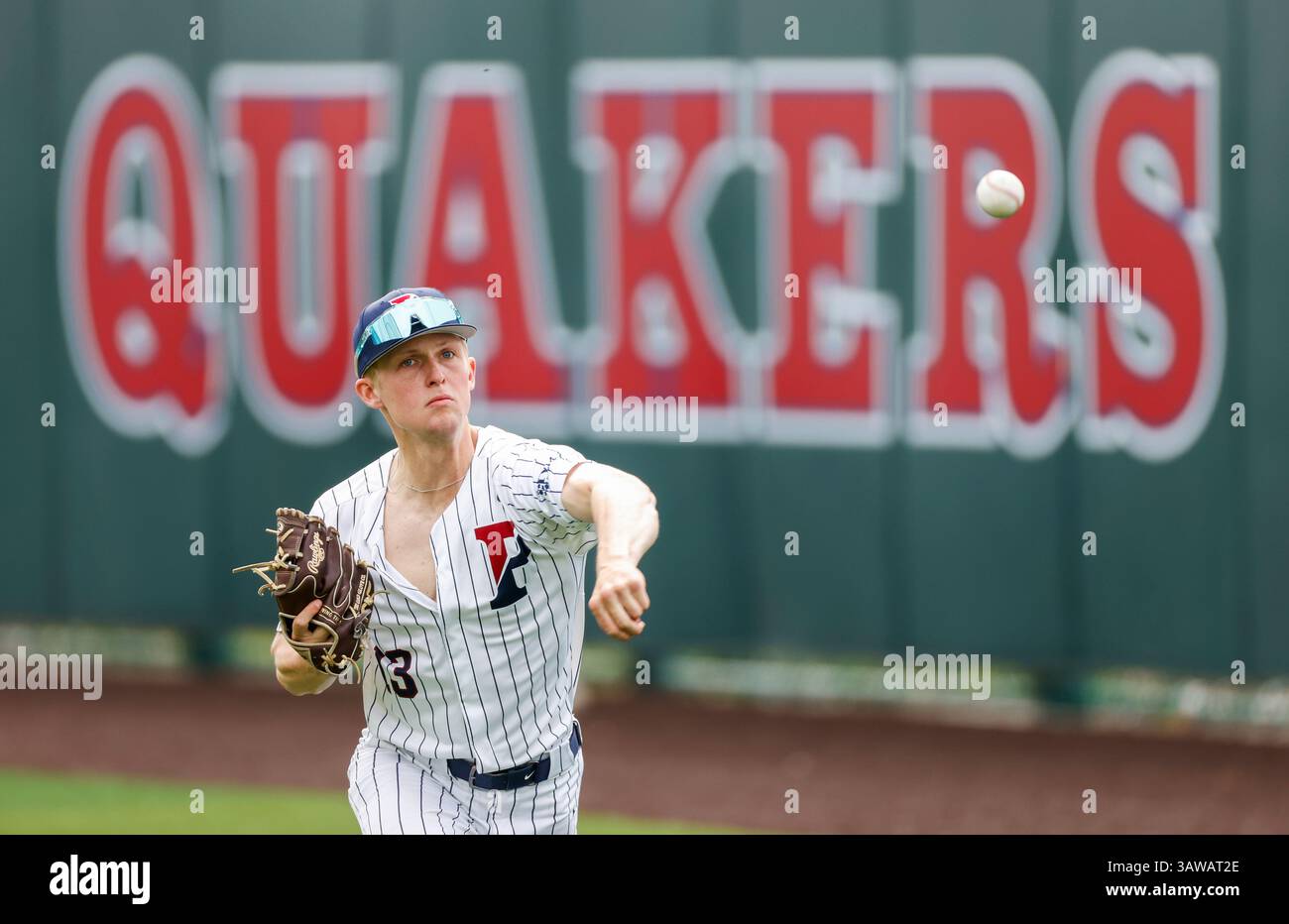 Penn left hand pitcher Will Tobin warms-up before facing Yale during an ...