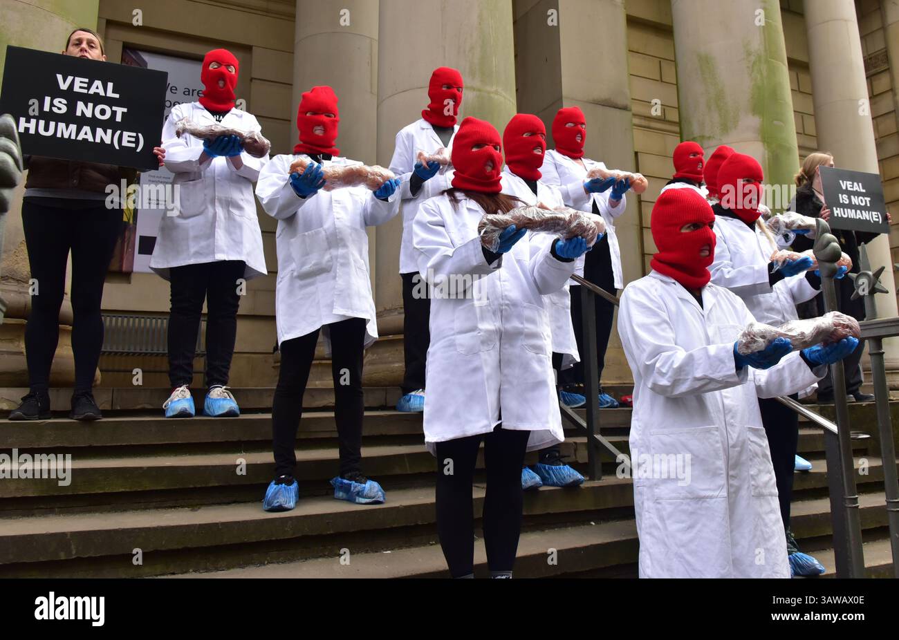 Manchester, UK, 19th April, 2025. A group of people wearing white coats ...