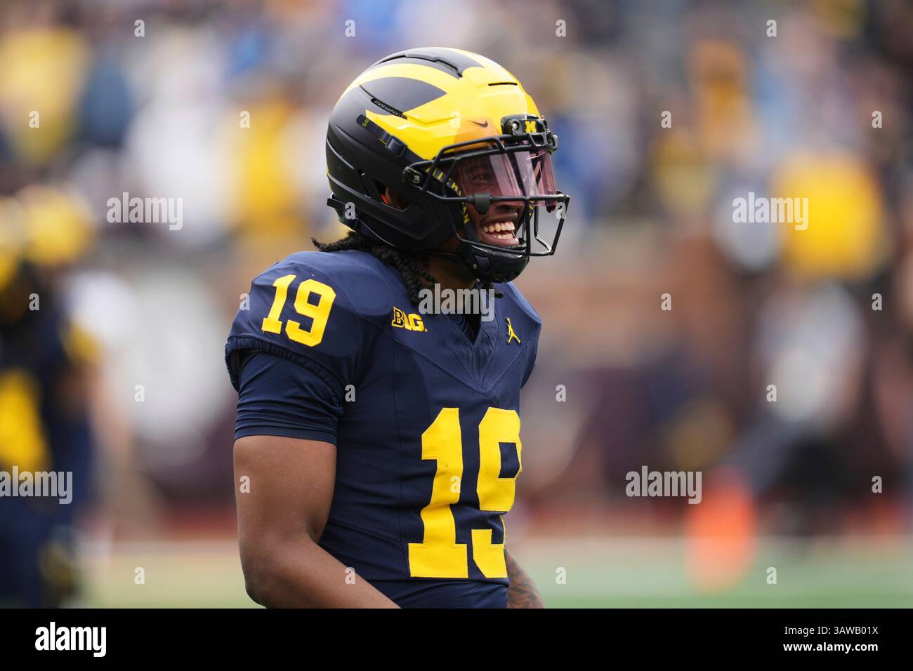 Michigan quarterback Bryce Underwood smiles during an NCAA college ...
