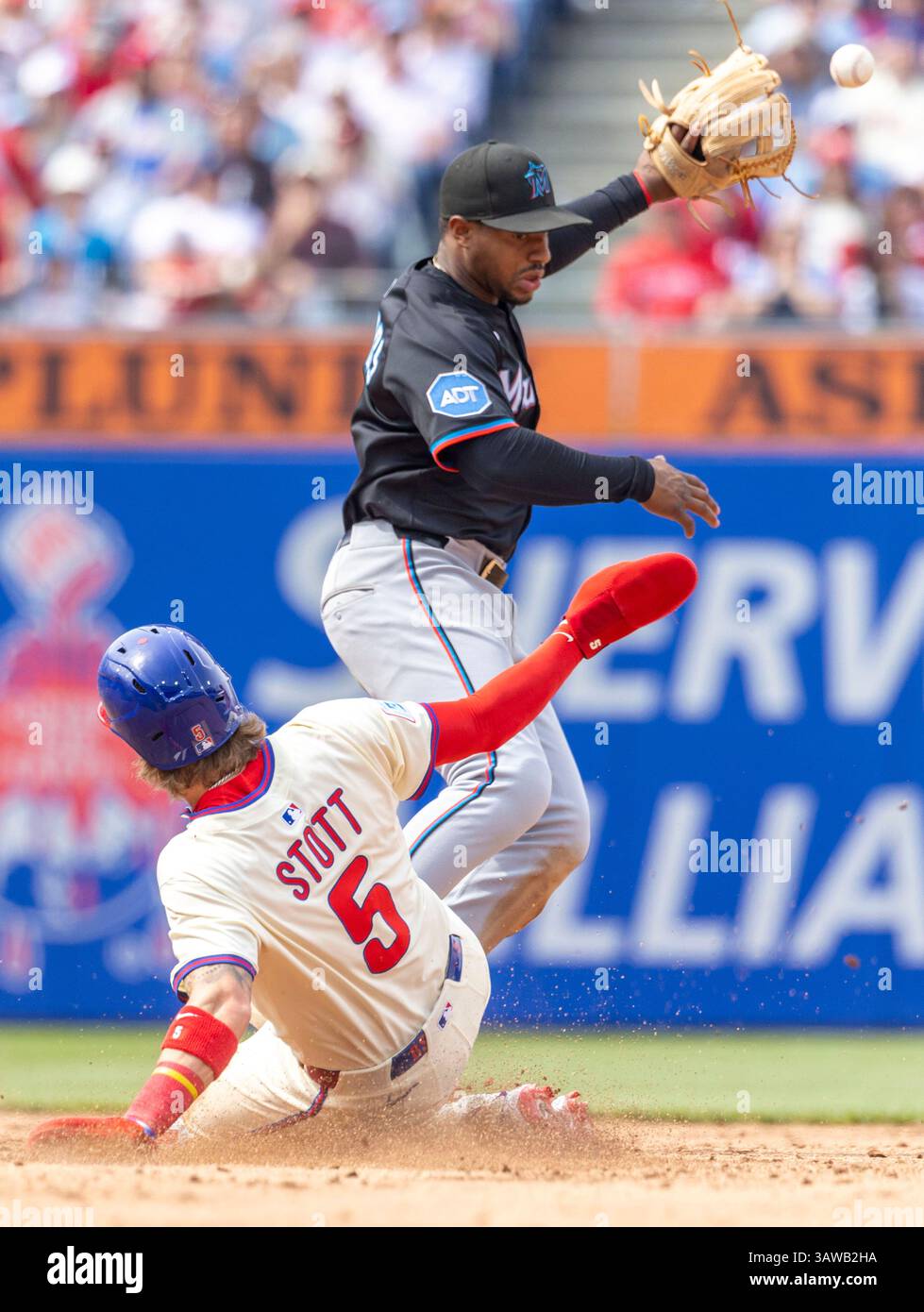 Philadelphia Phillies' Bryson Stott (5) is safe at second before Miami ...