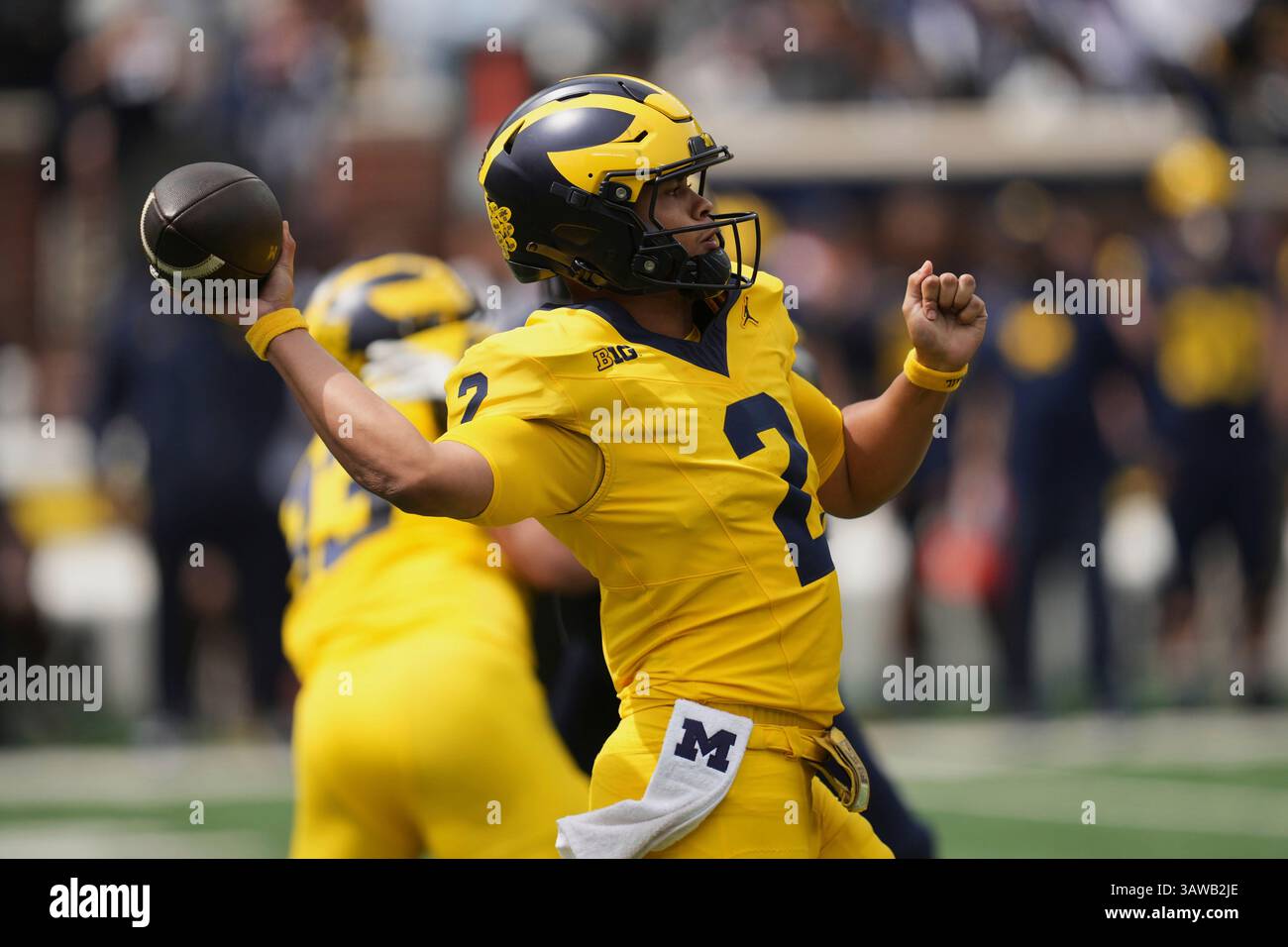 Michigan quarterback Jadyn Davis throws during an NCAA college football ...