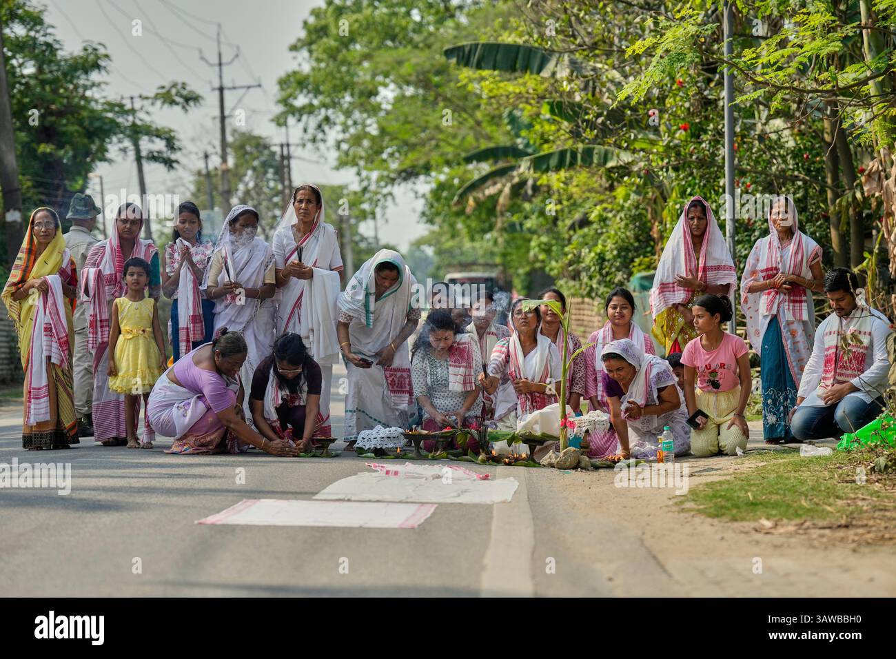 Villagers wait to welcome a village king during the Gohain Uliuwa Mela ...