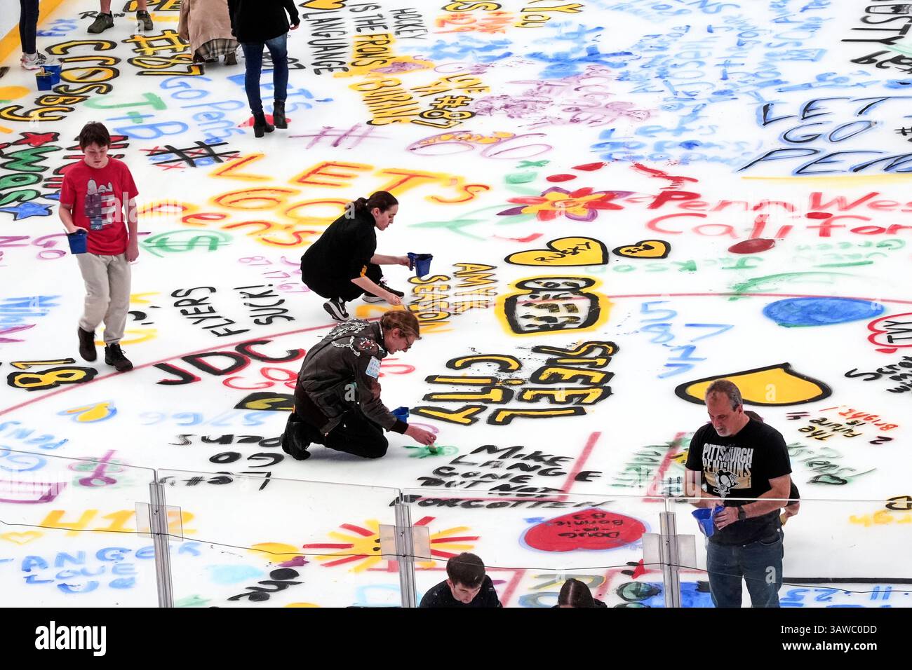 Pittsburgh Penguins season ticket holders participate in Paint The Ice ...