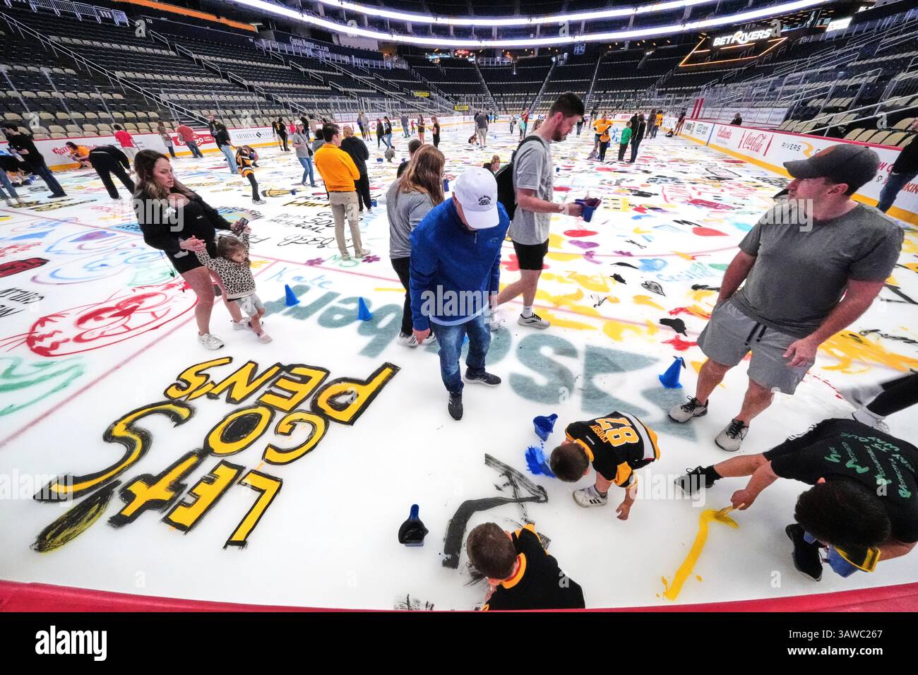 Pittsburgh Penguins season ticket holders participate in Paint The Ice ...