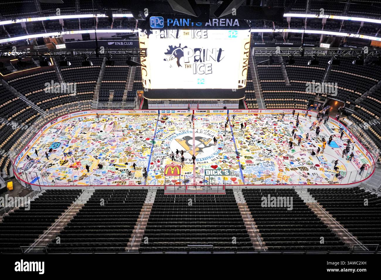 Pittsburgh Penguins season ticket holders participate in Paint The Ice ...