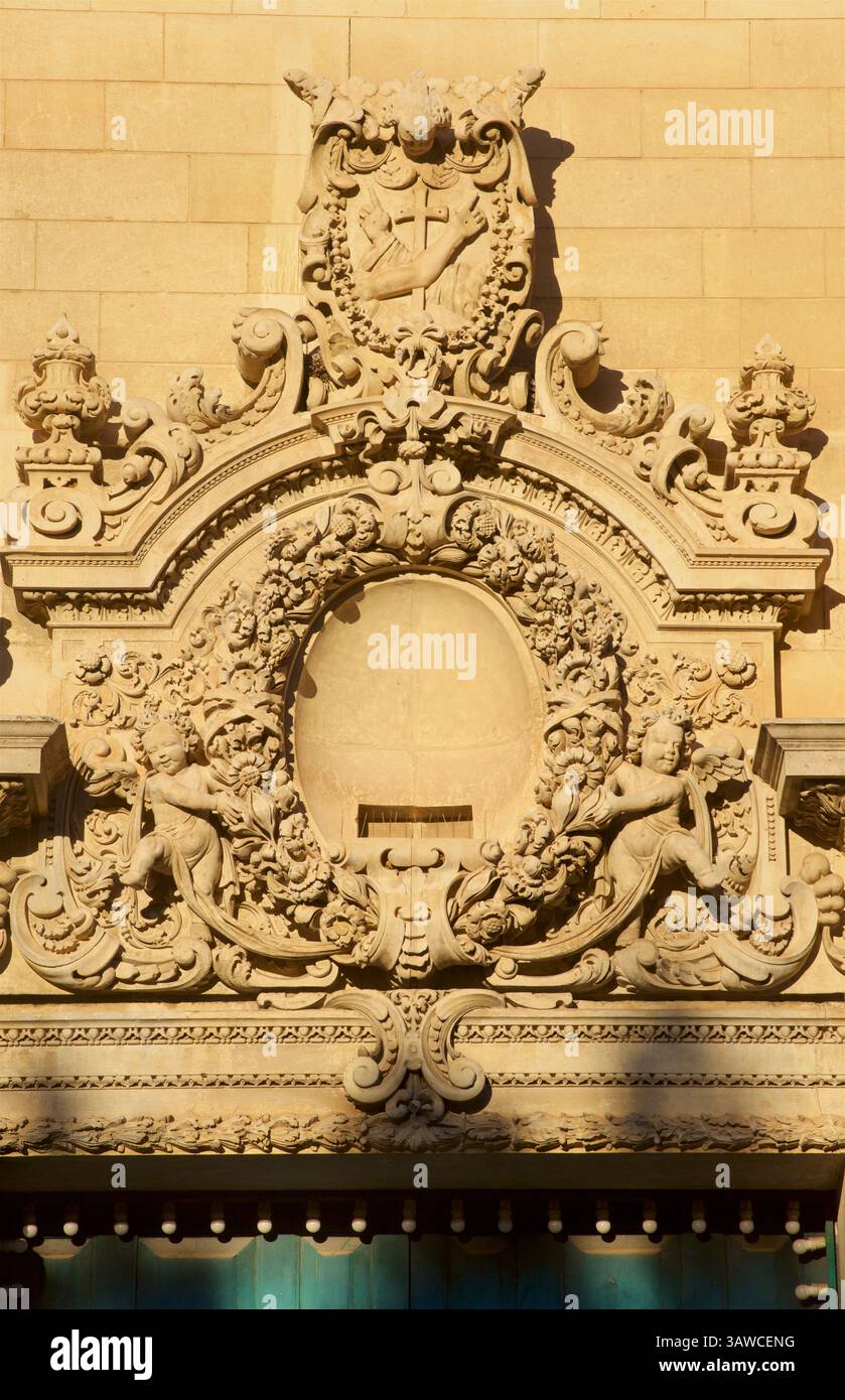 Italy, Puglia, Lecce. Architectural detail above a doorway to St Chiara ...