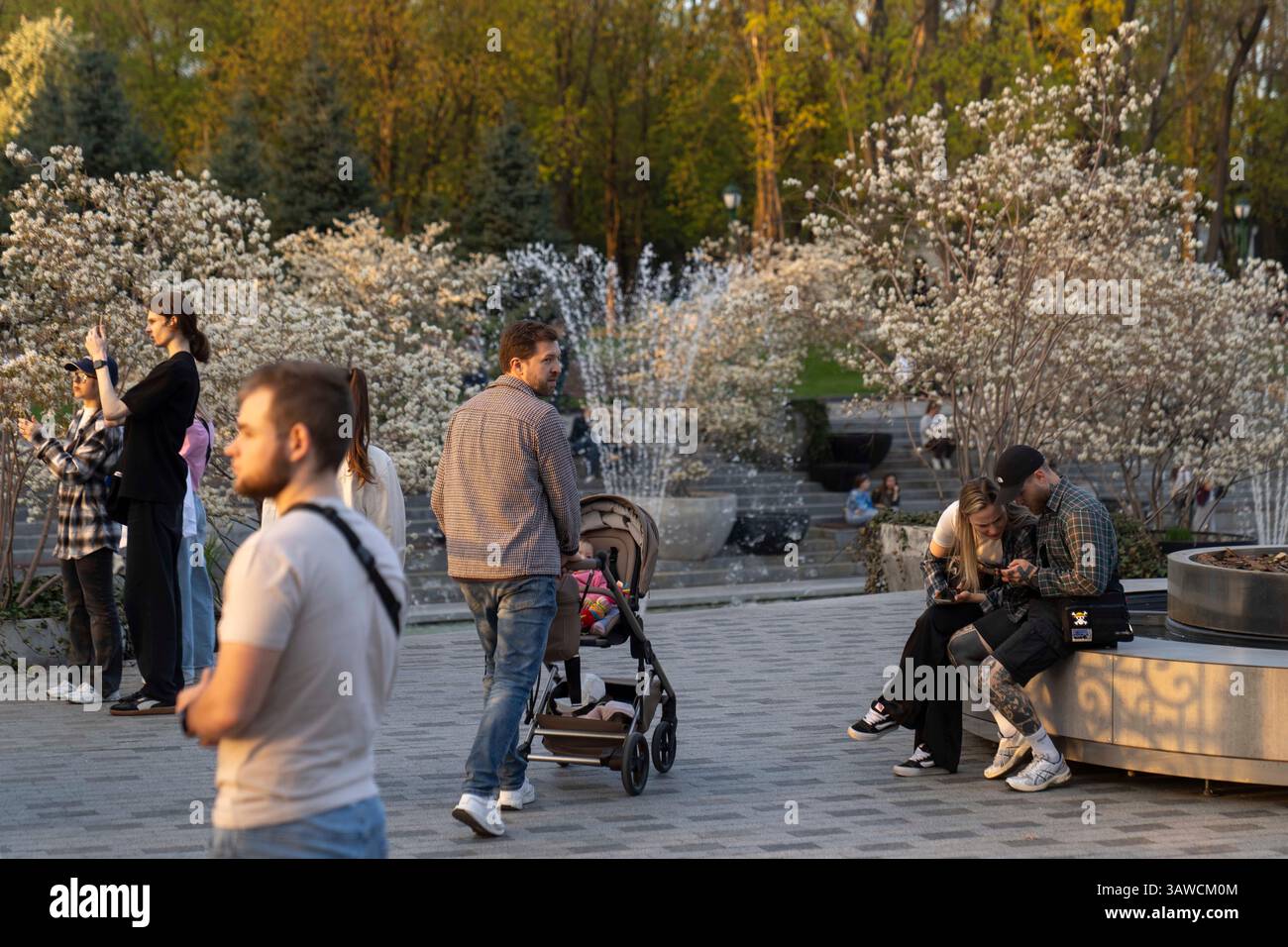 Kharkiv, Ukraine. 19th April, 2025. People are seen enjoying the spring ...