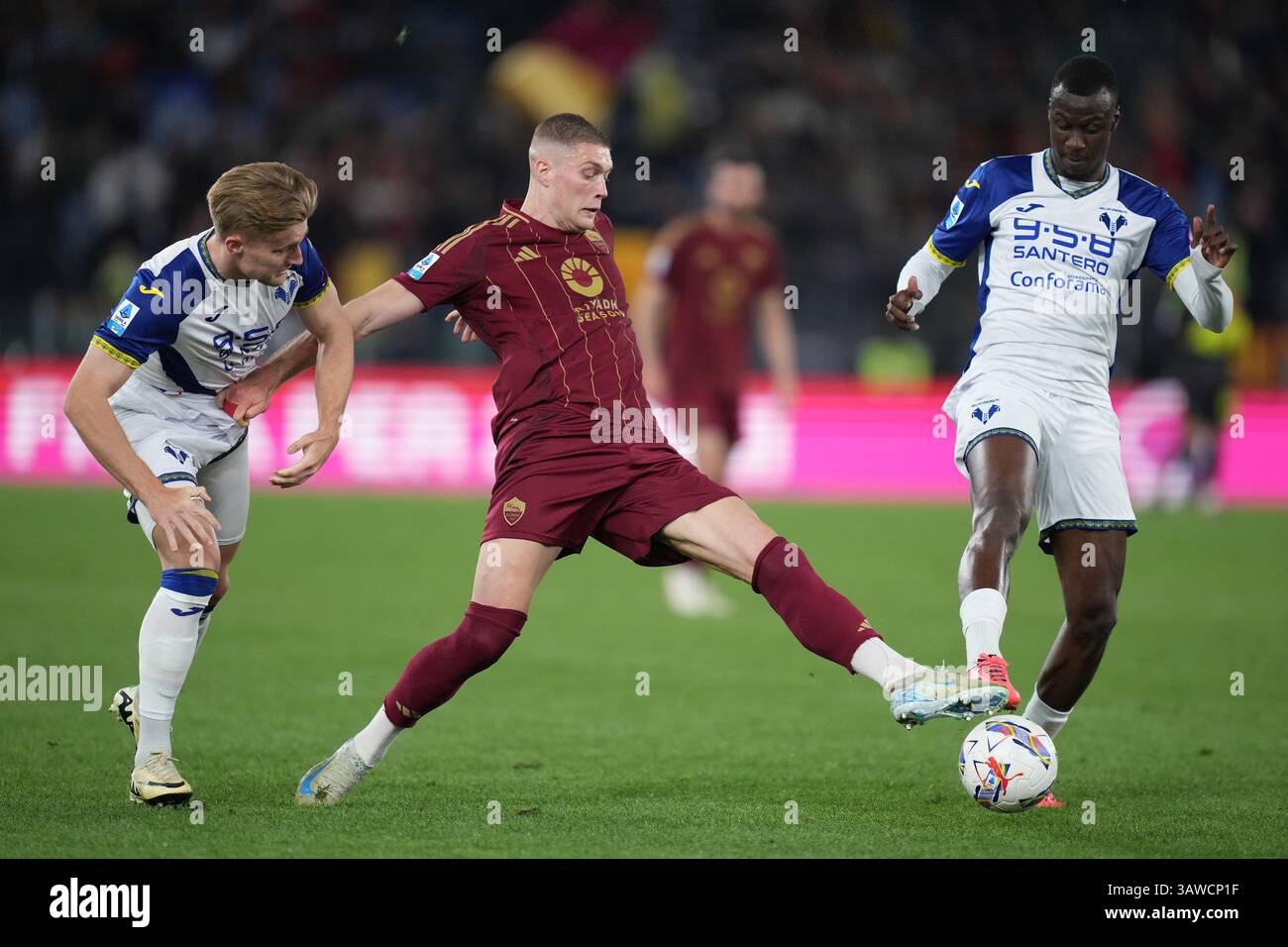Roma, Italia. 19th Apr, 2025. Verona's Martin Frese Roma's Artem Dovbyk ...